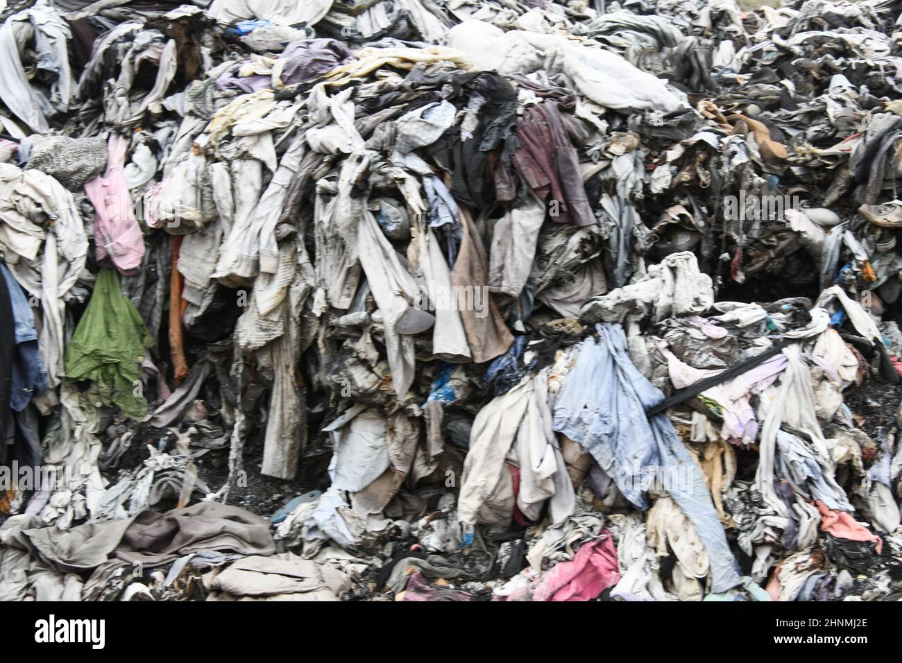 Burnt clothes on a bin in the province of Alicante, Costa Blanca, Spain ...