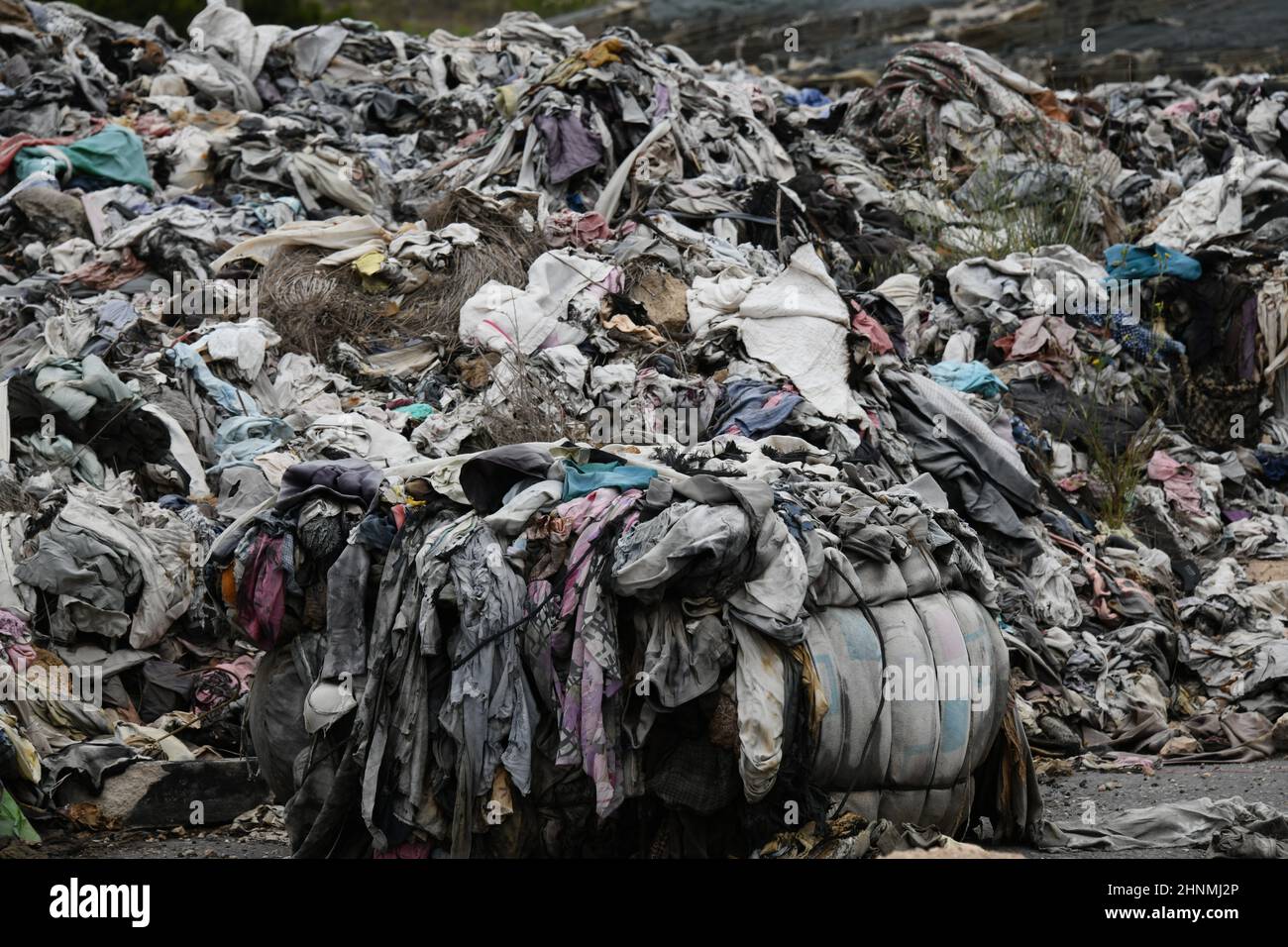 Burnt clothes on a bin in the province of Alicante, Costa Blanca, Spain ...