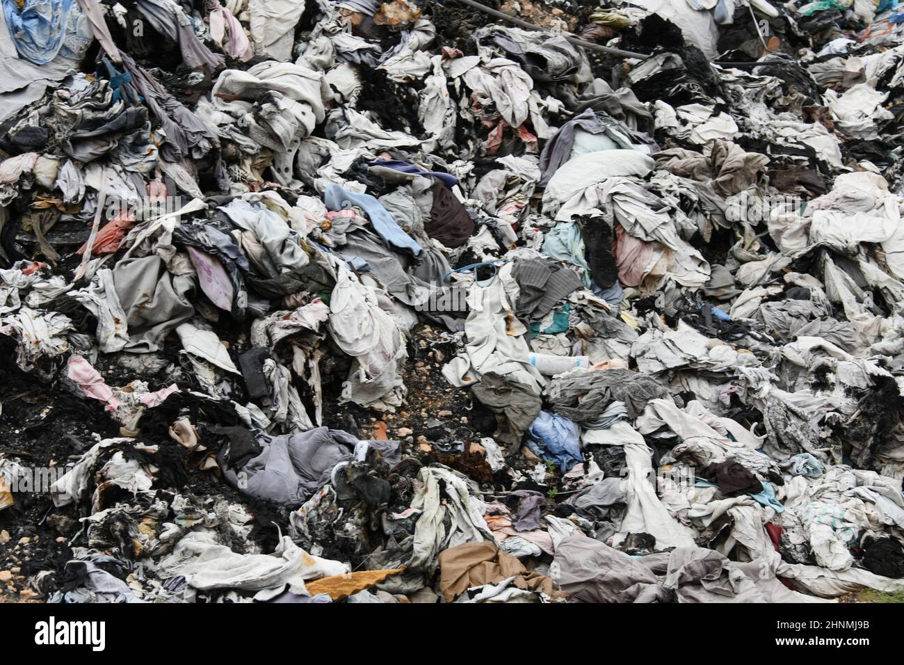 Burnt clothes on a bin in the province of Alicante, Costa Blanca, Spain ...