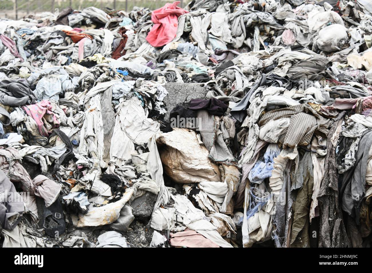 Burnt clothes on a bin in the province of Alicante, Costa Blanca, Spain ...