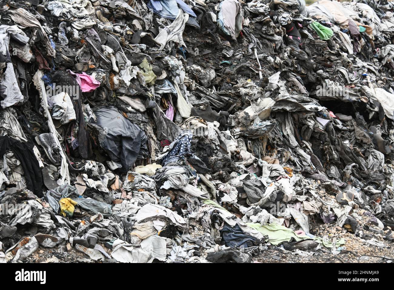Burnt clothes on a bin in the province of Alicante, Costa Blanca, Spain ...