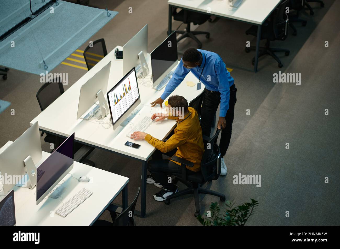 Managers works on computers, workplace in IT office. Professional ...