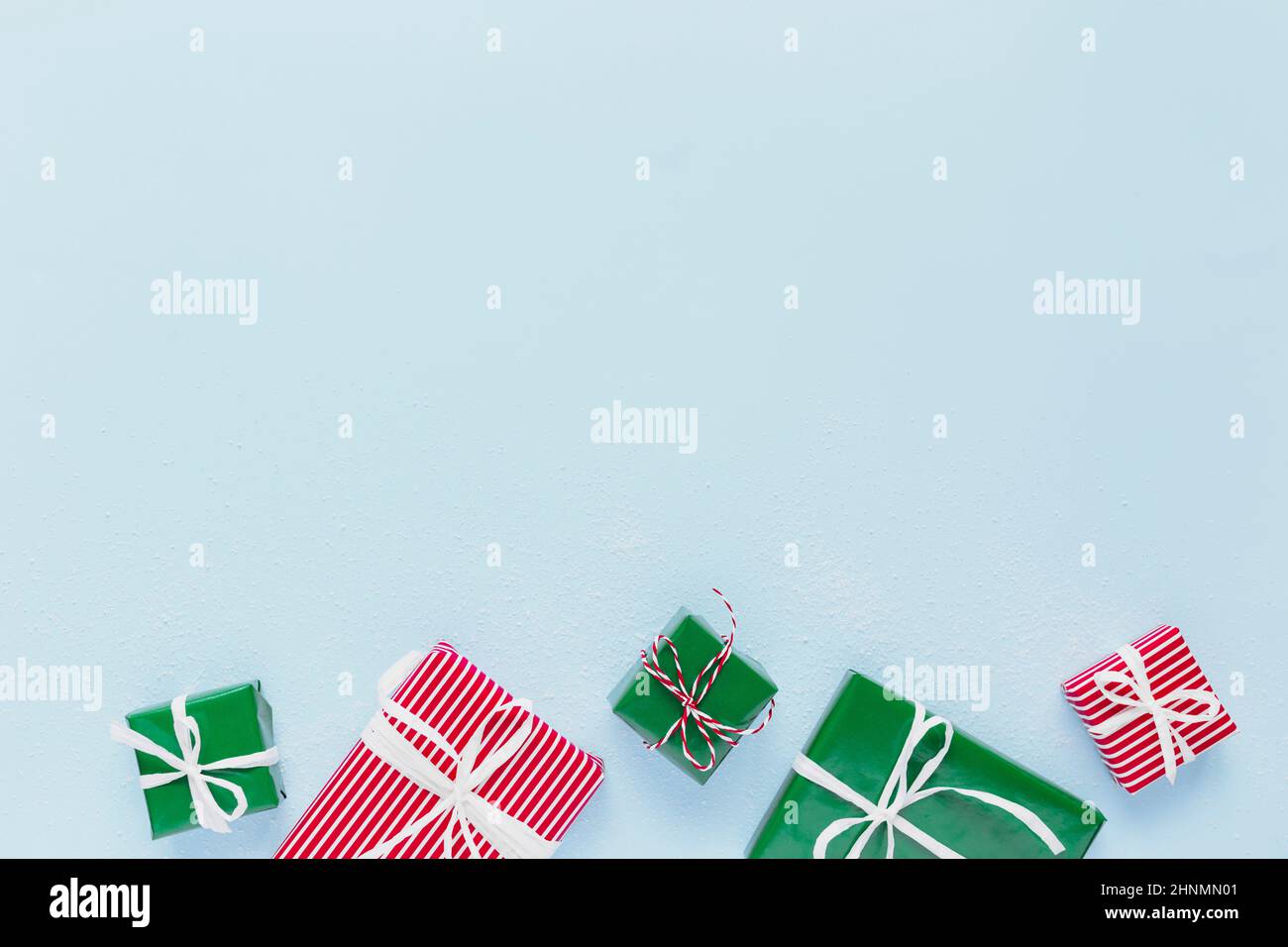 Christmas and New Year blue flat lay with various red, white and green ...