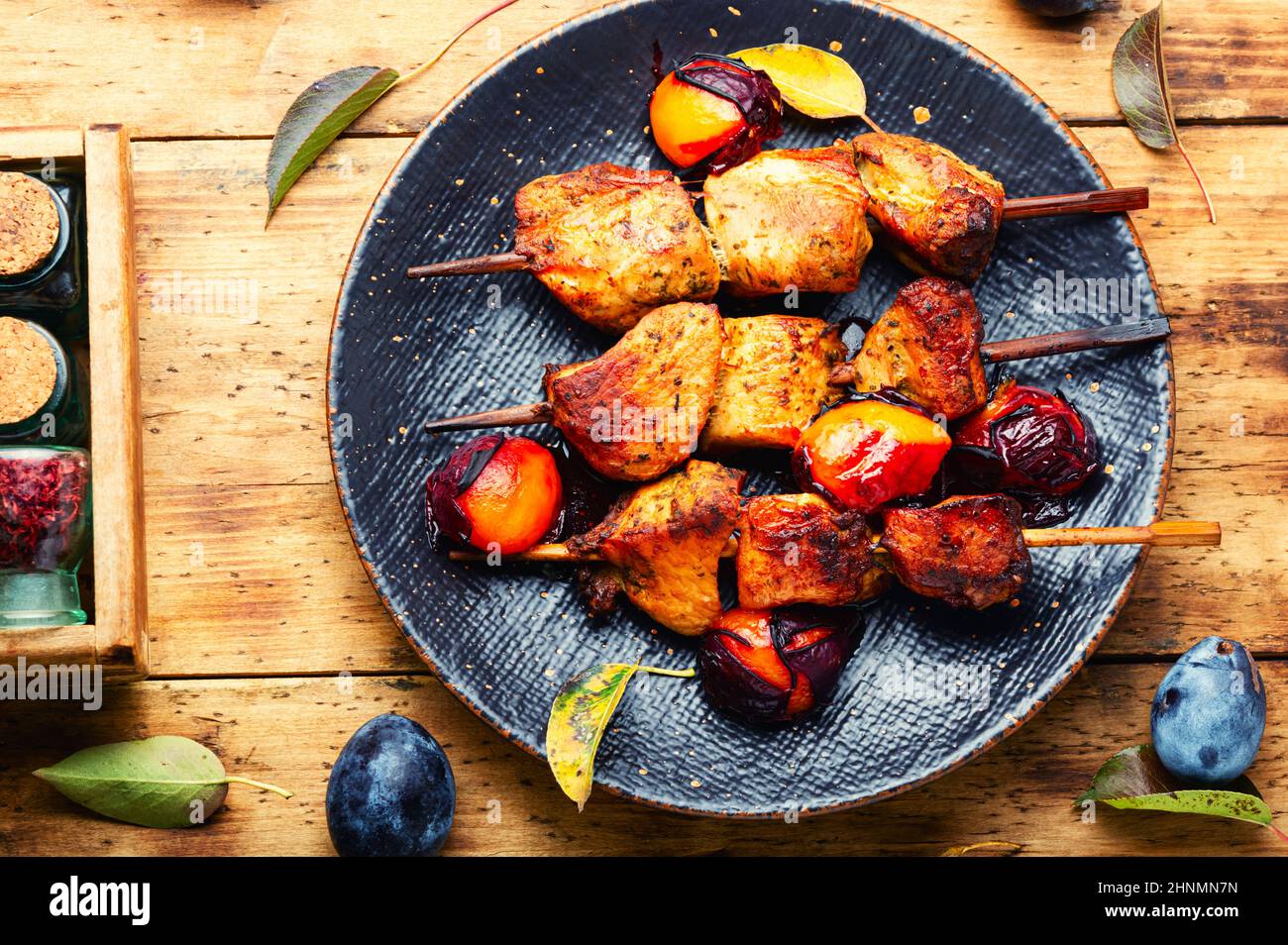 Fried meat on wooden stick,kebabs in plum sauce.Pork barbecue Stock ...