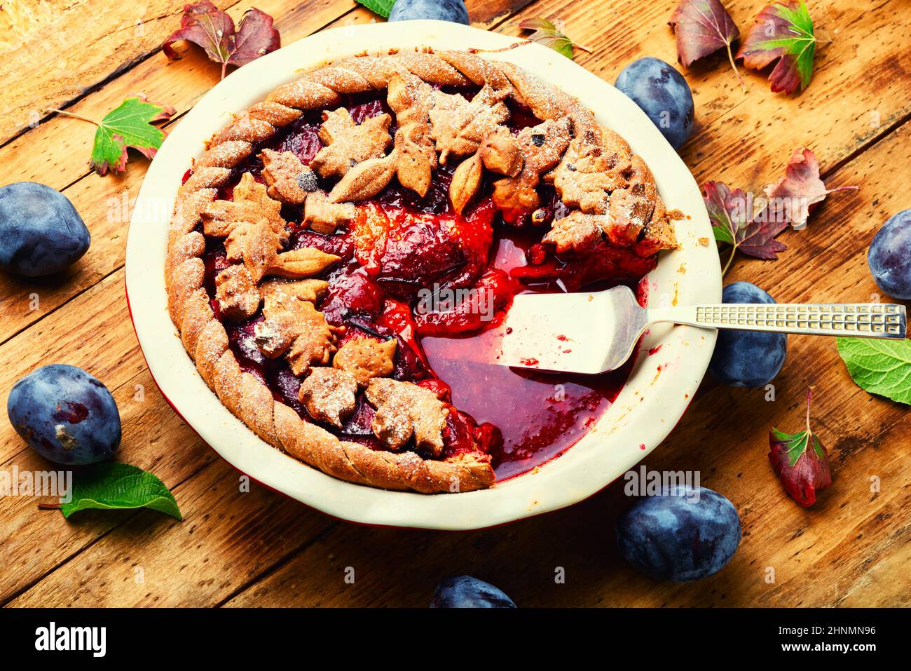 Autumnal yummy pie with plum.Fruit summer pastries Stock Photo - Alamy