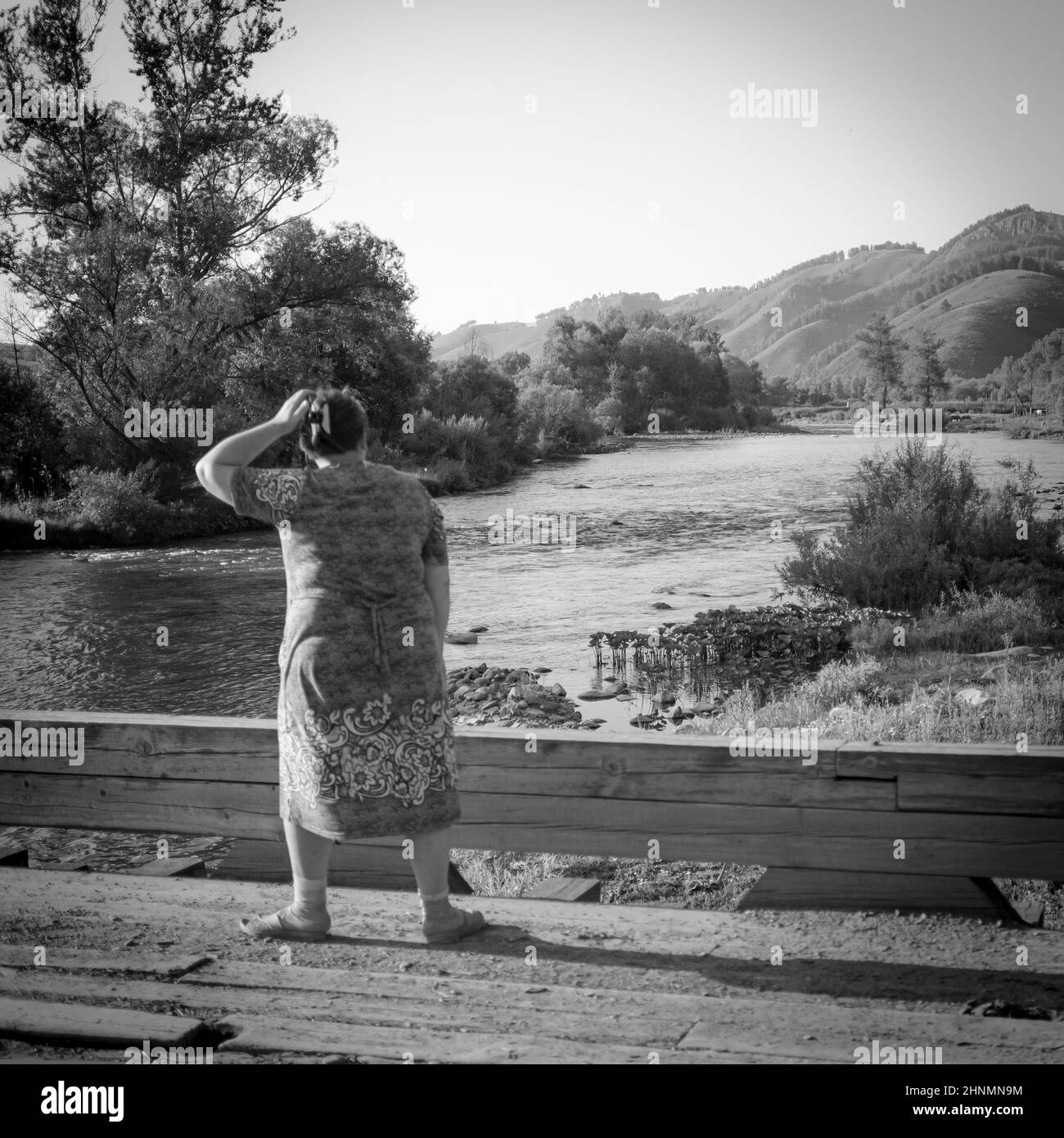 31st July, Russia, Altay, woman looking on mountains Stock Photo - Alamy