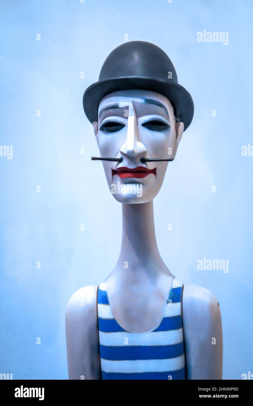 A wooden dummy with the face of a stern-looking man Stock Photo - Alamy