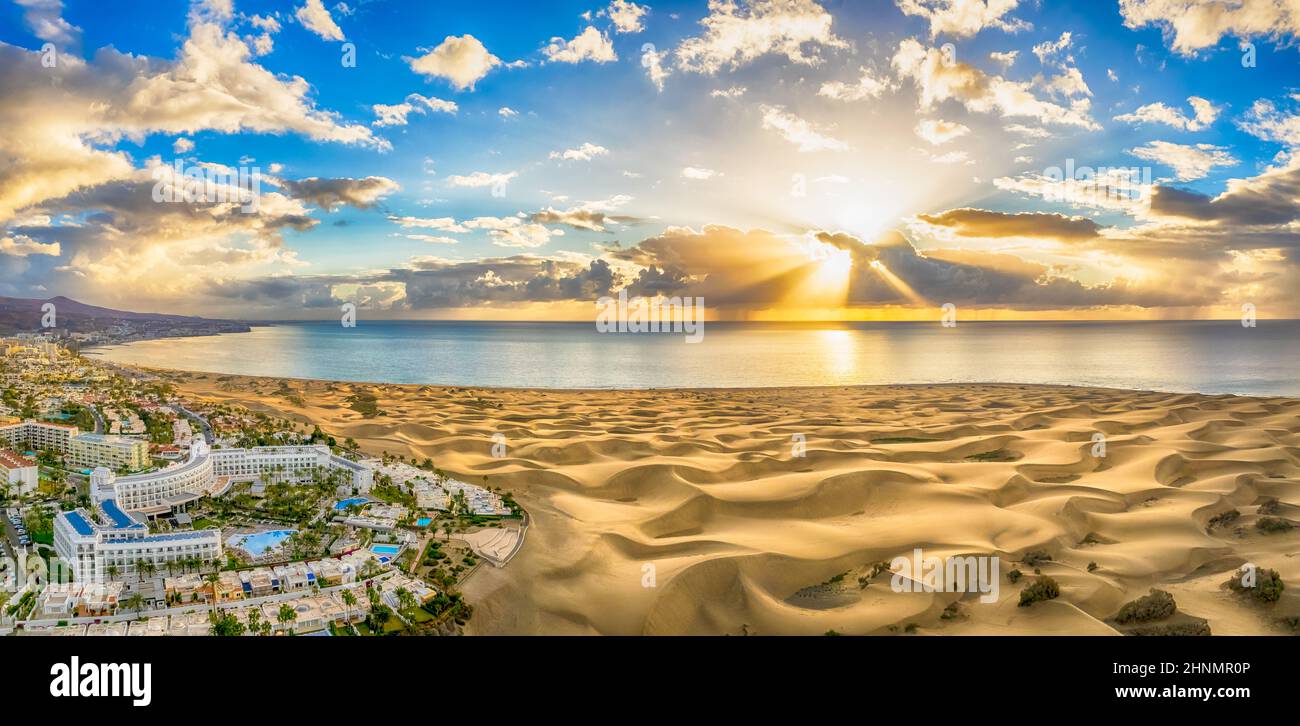 Landscape with Maspalomas town and golden sand dunes at sunrise, Gran ...