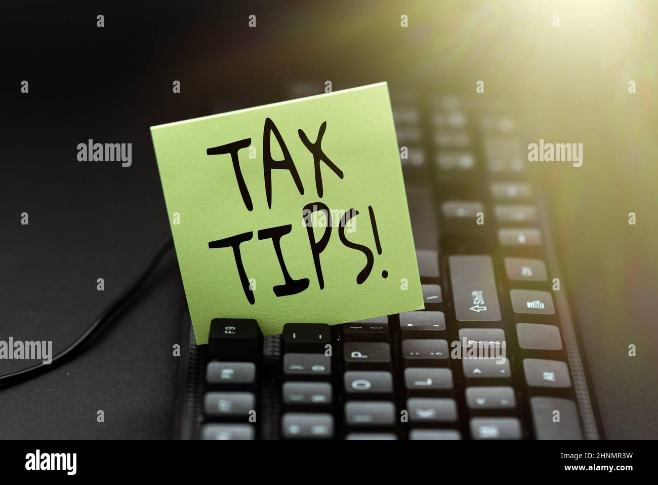 Sign displaying Tax Tips, Concept meaning compulsory contribution to ...