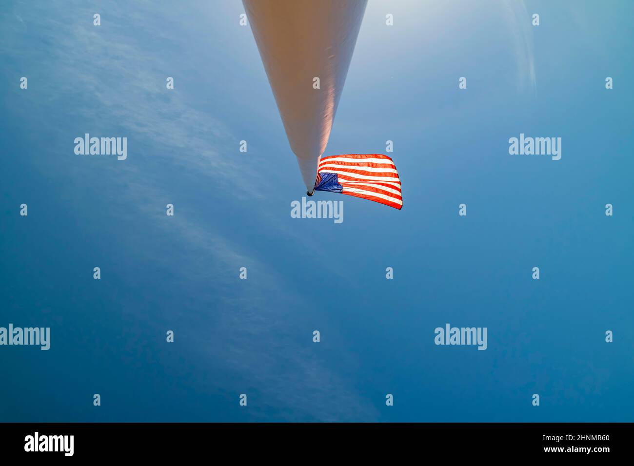 Looking up the America flag swinging on a pole at Los Angeles Stock ...