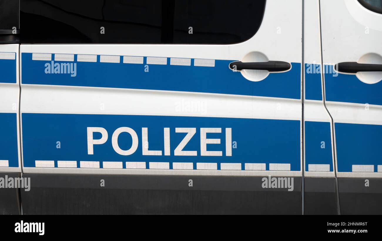 Lettering Polizei on blue Stock Photo - Alamy
