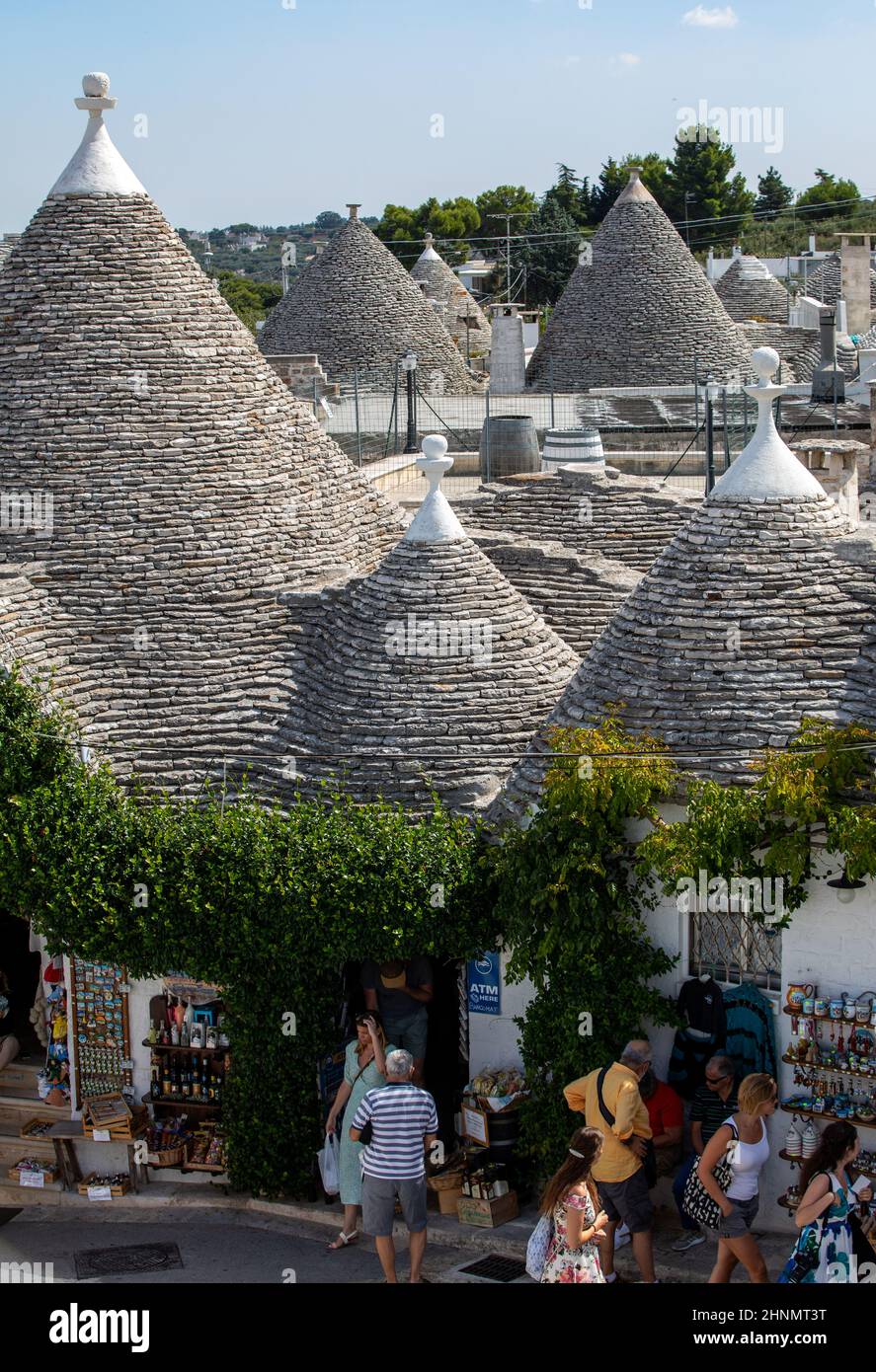 People visit Trulli village in Alberobello, Italy Stock Photo - Alamy