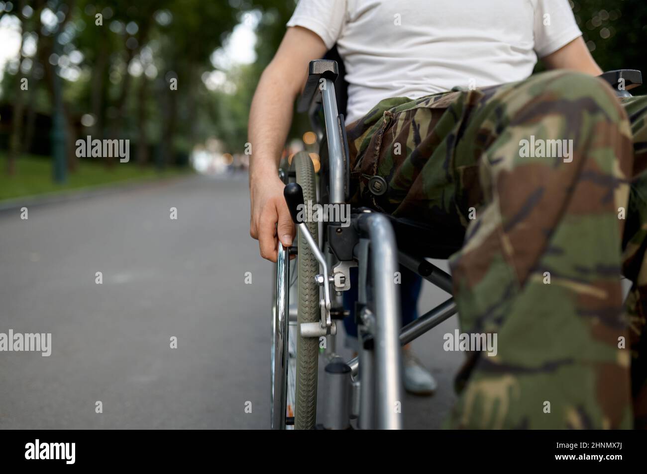 Disabled soldier, view on legs. Paralyzed people and disability ...