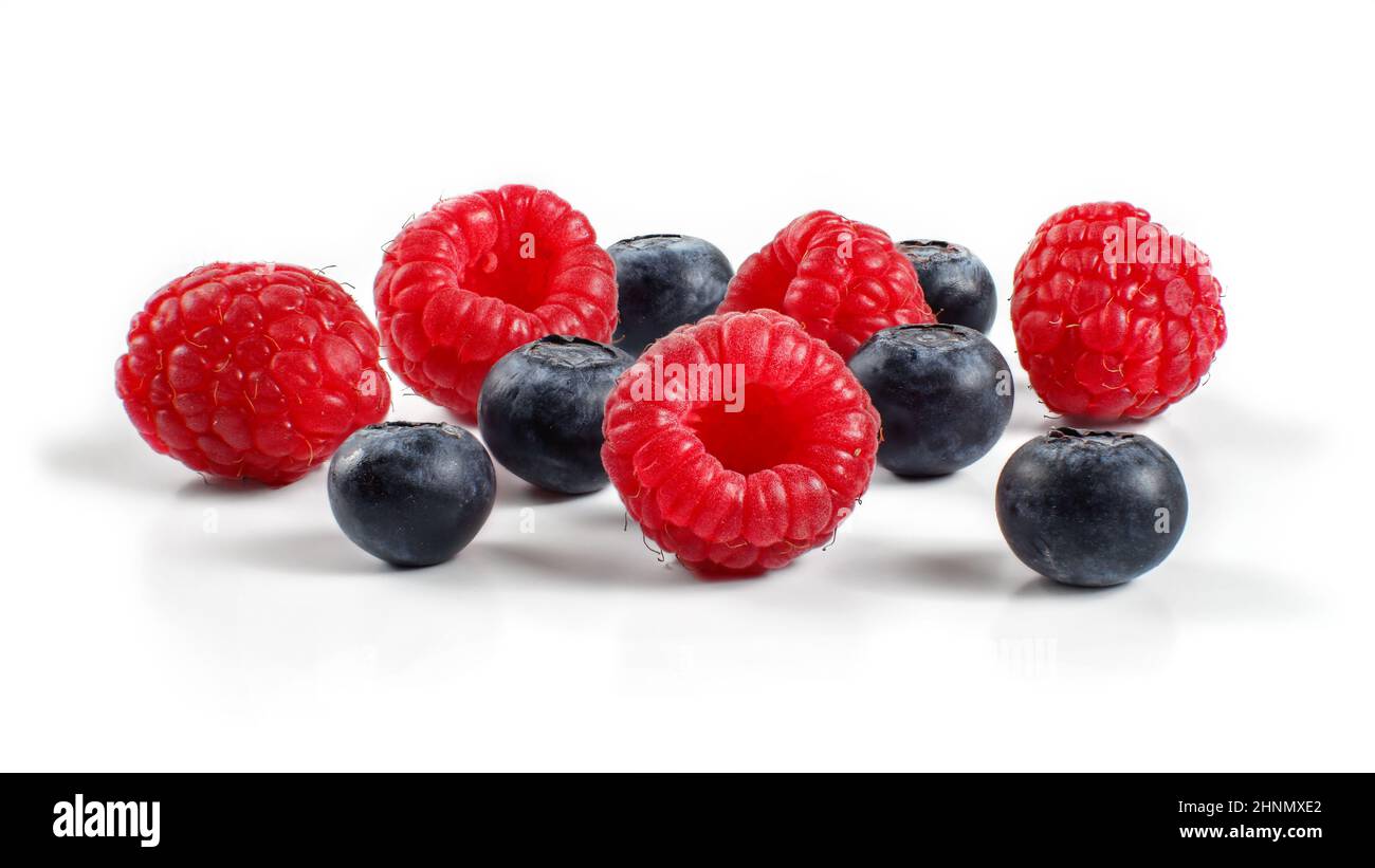 Mixed blueberries and raspberries isolated on white background Stock ...
