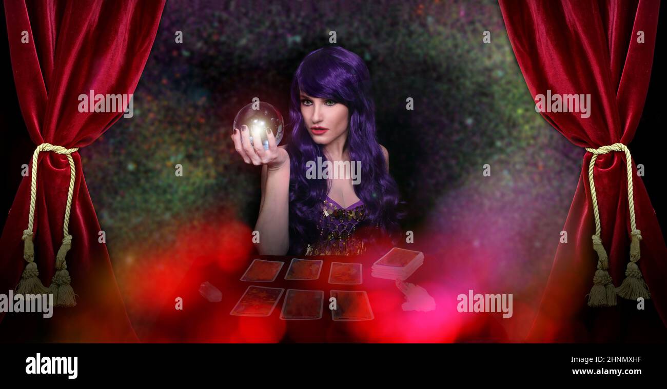 Psychic with Crystal Ball and tarot cards in Red Velvet Tent Stock ...