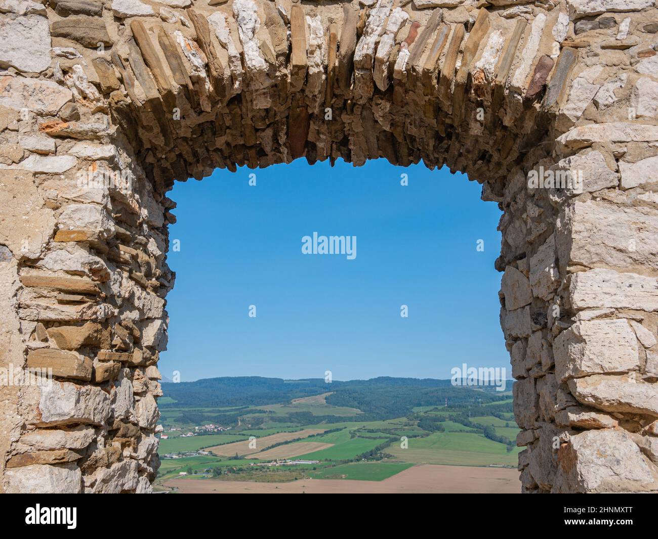 Bricked window opening from old ruin with beautiful view Stock Photo ...