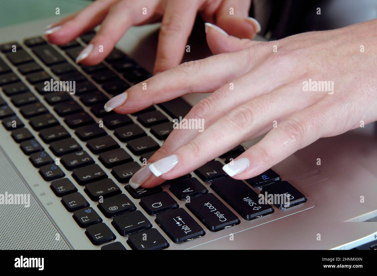 Woman typing computer hi-res stock photography and images - Alamy