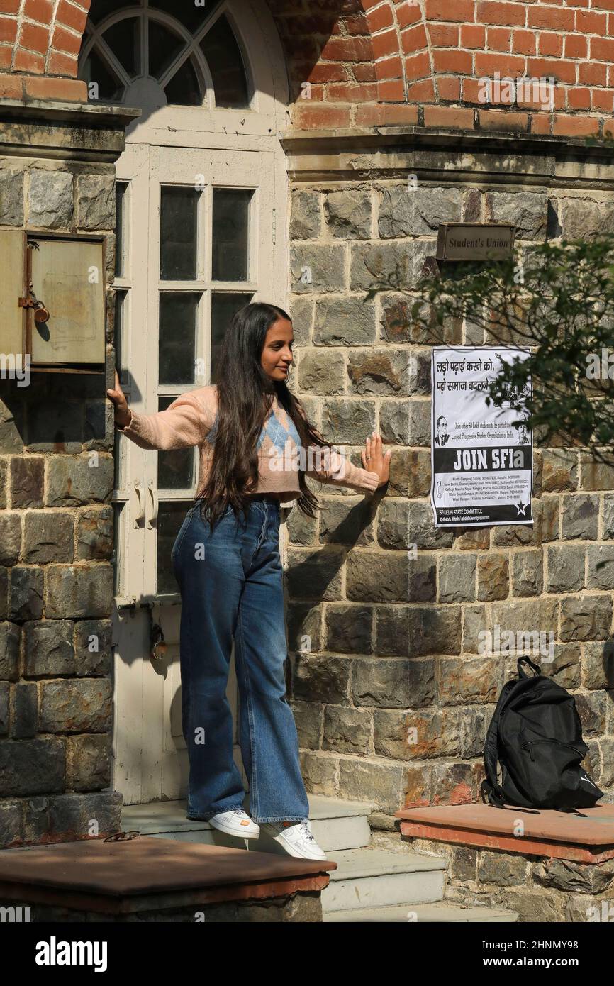 New Delhi, India. 17th Feb, 2022. A student poses for her photo on the ...