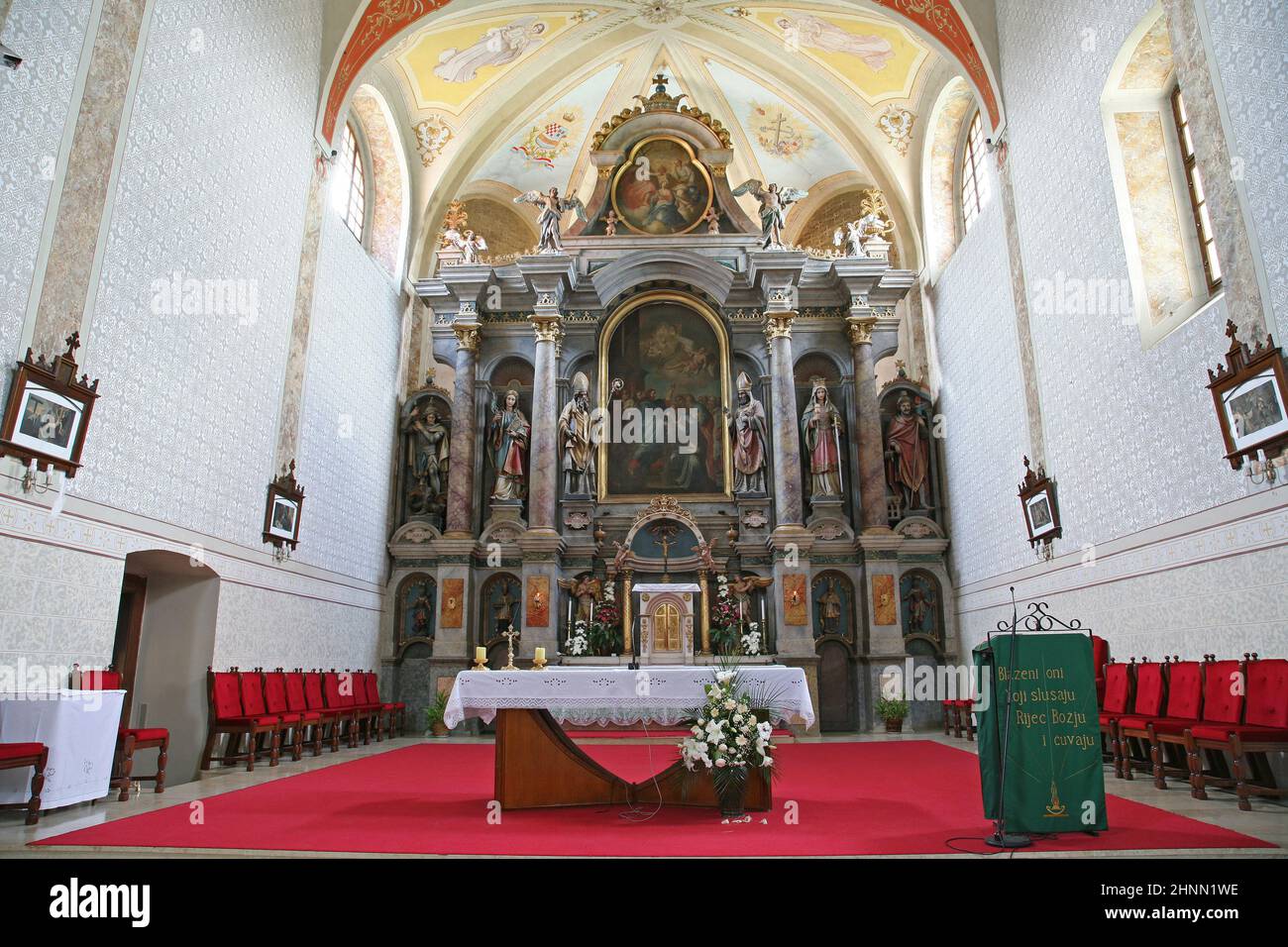 High altar in the Franciscan Church of St. Peter in Cernik, Croatia ...