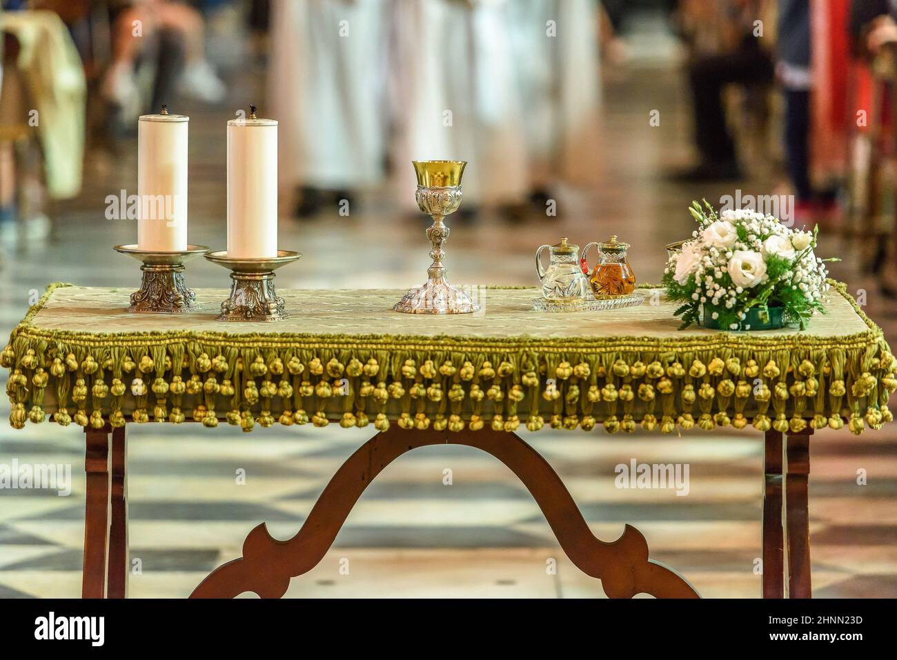 Table ready for the rite of the Holy Communion, during the catholic ...