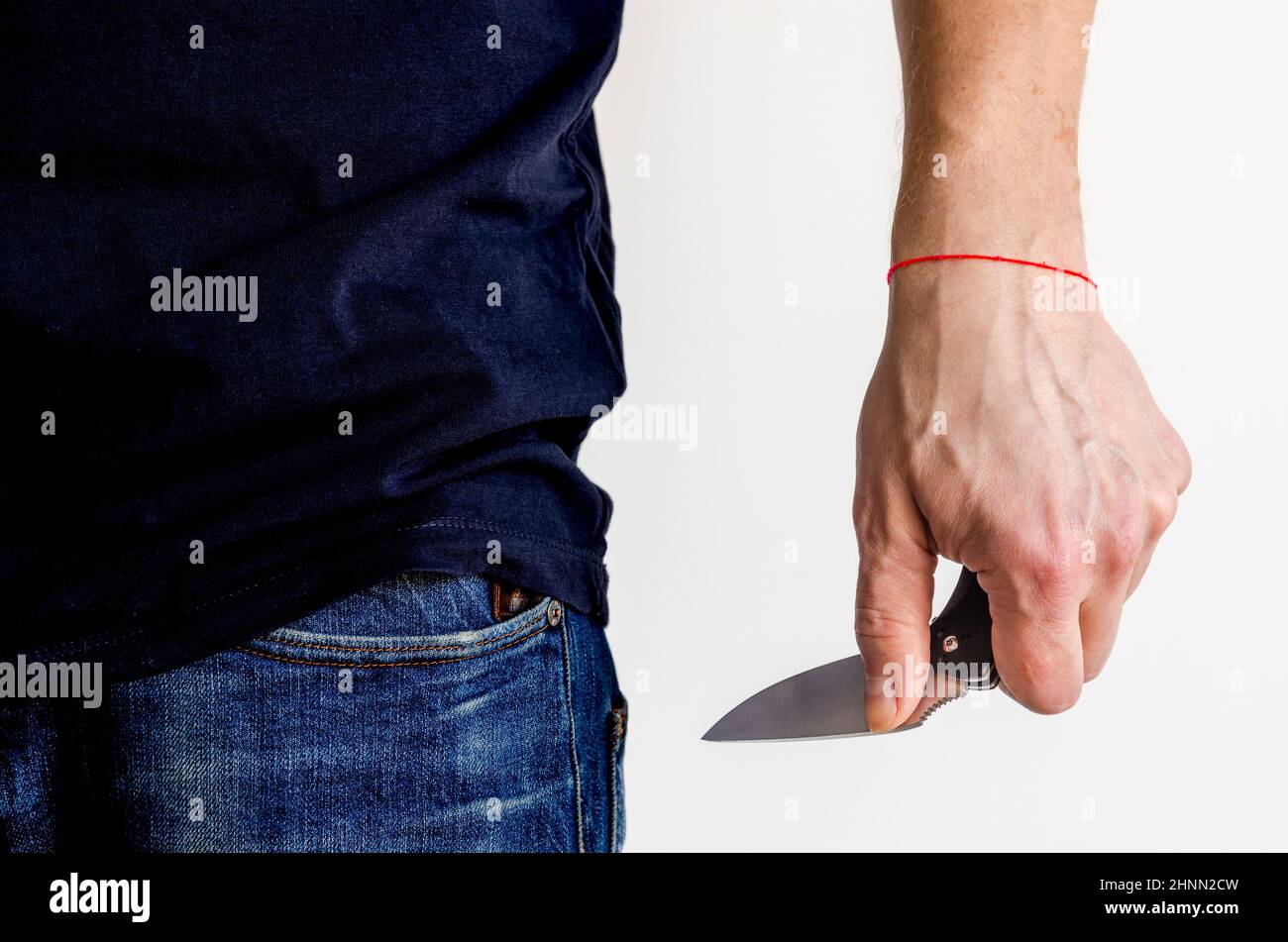 The man using folding knife. Close up folding knife in hand. EDC for ...