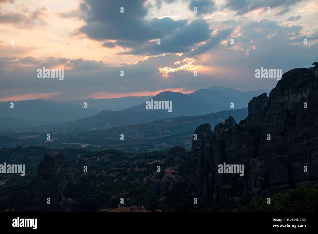 Monasteries built on cliffs, Meteora at sunset, Greece Stock Photo - Alamy