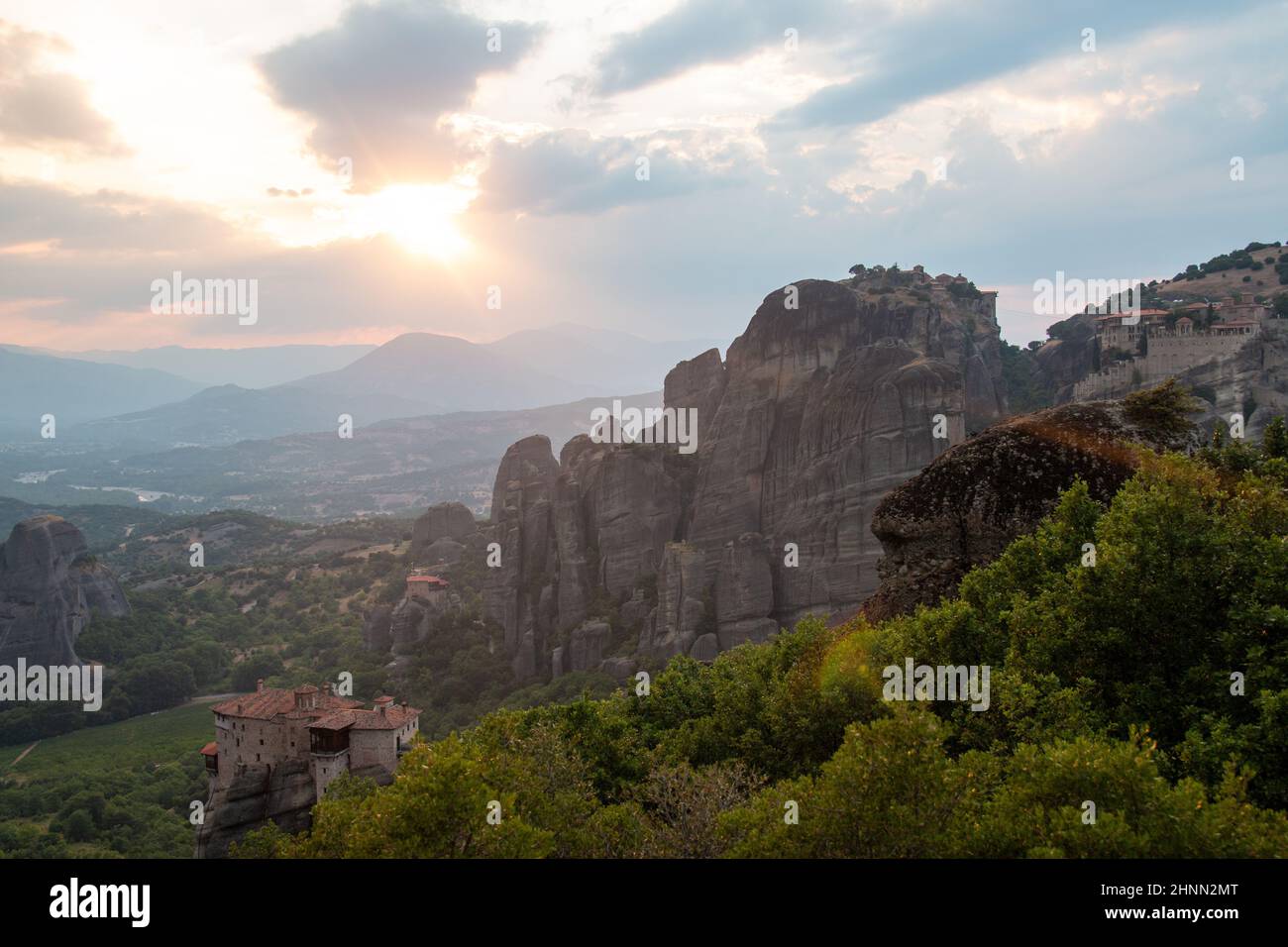 Monasteries built on cliffs, Meteora at sunset, Greece Stock Photo - Alamy