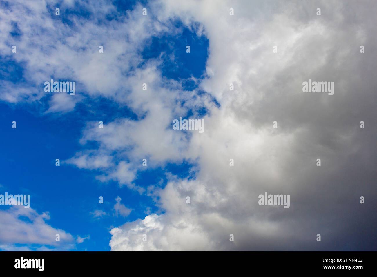 Blue sky closed by amazing dark clouds and cloud formations in Nissedal ...