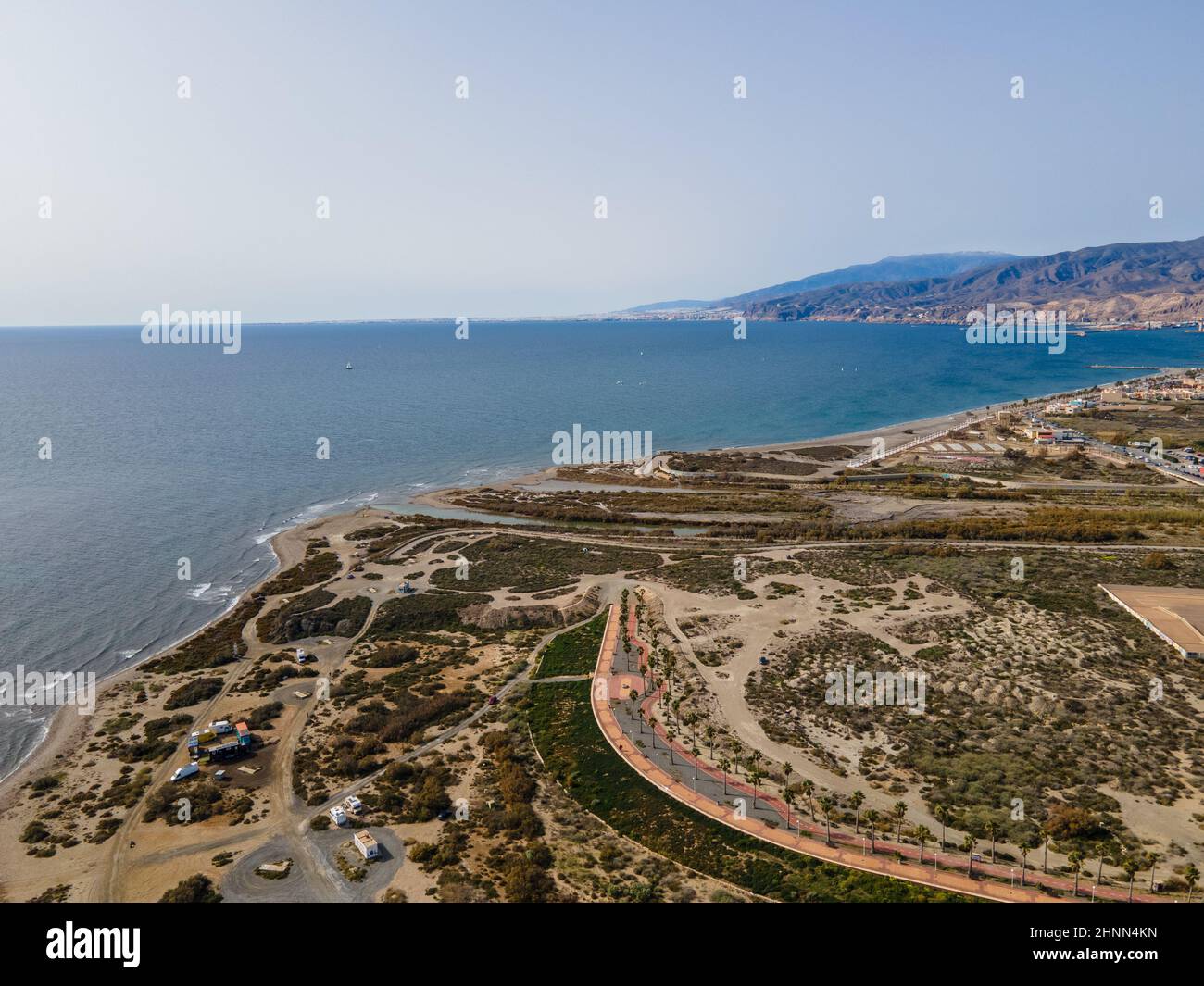Aerial view of Playa del Bobar beach and the mountains in the distance ...
