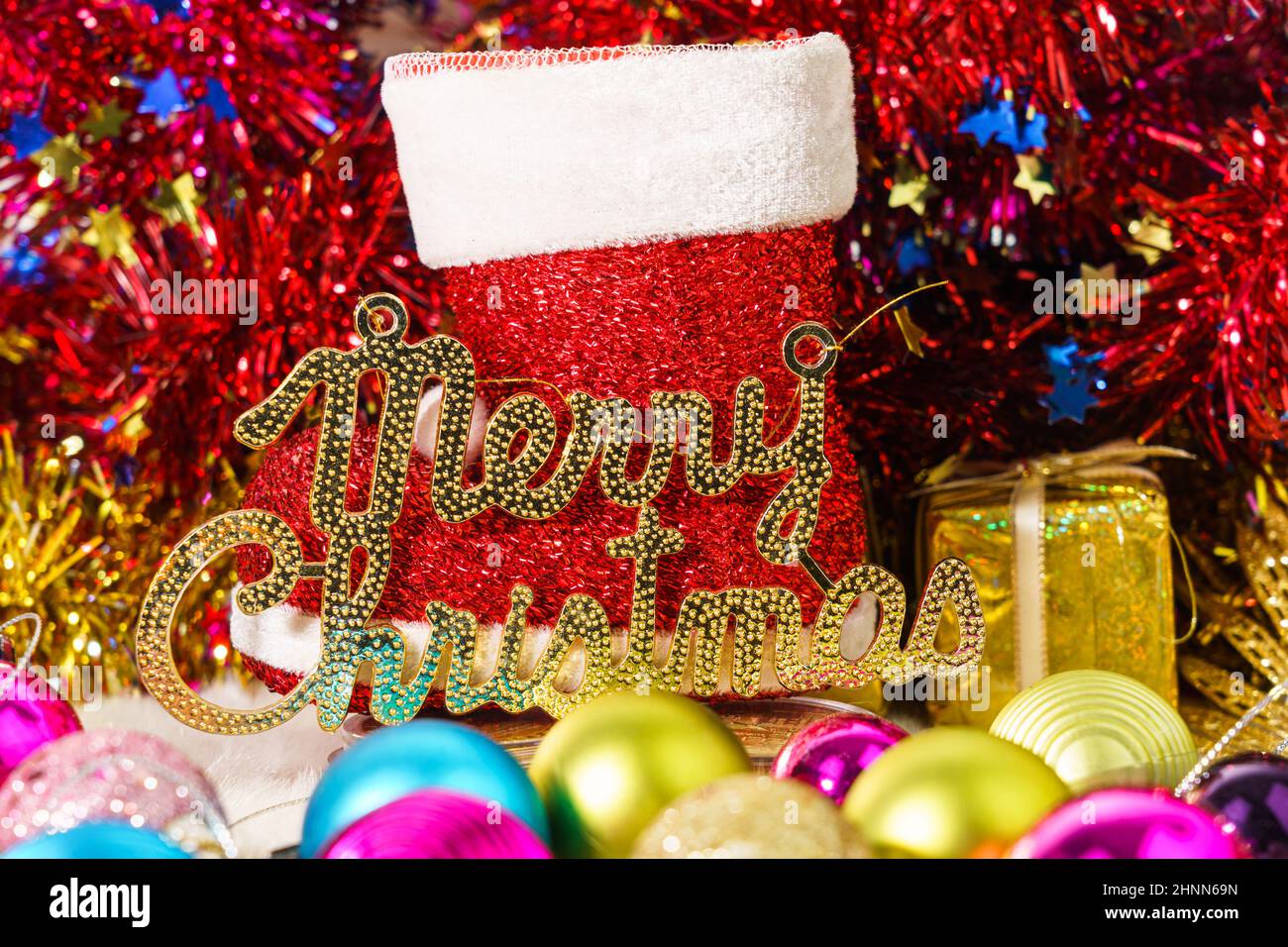 Red Santa claus boot and Christmas ornaments decorations background ...