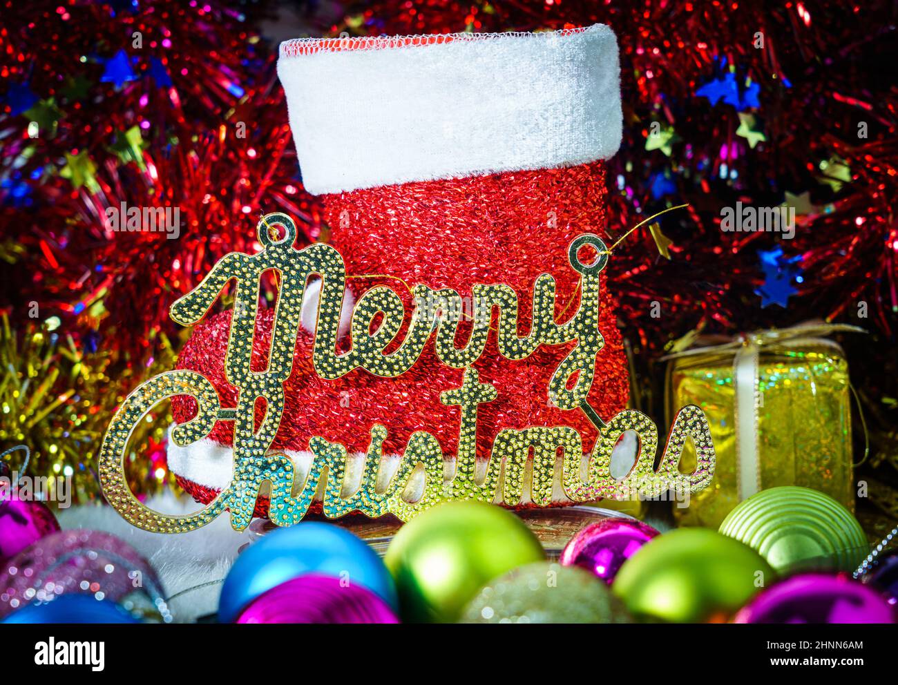 Red Santa claus boot and Christmas ornaments decorations background ...