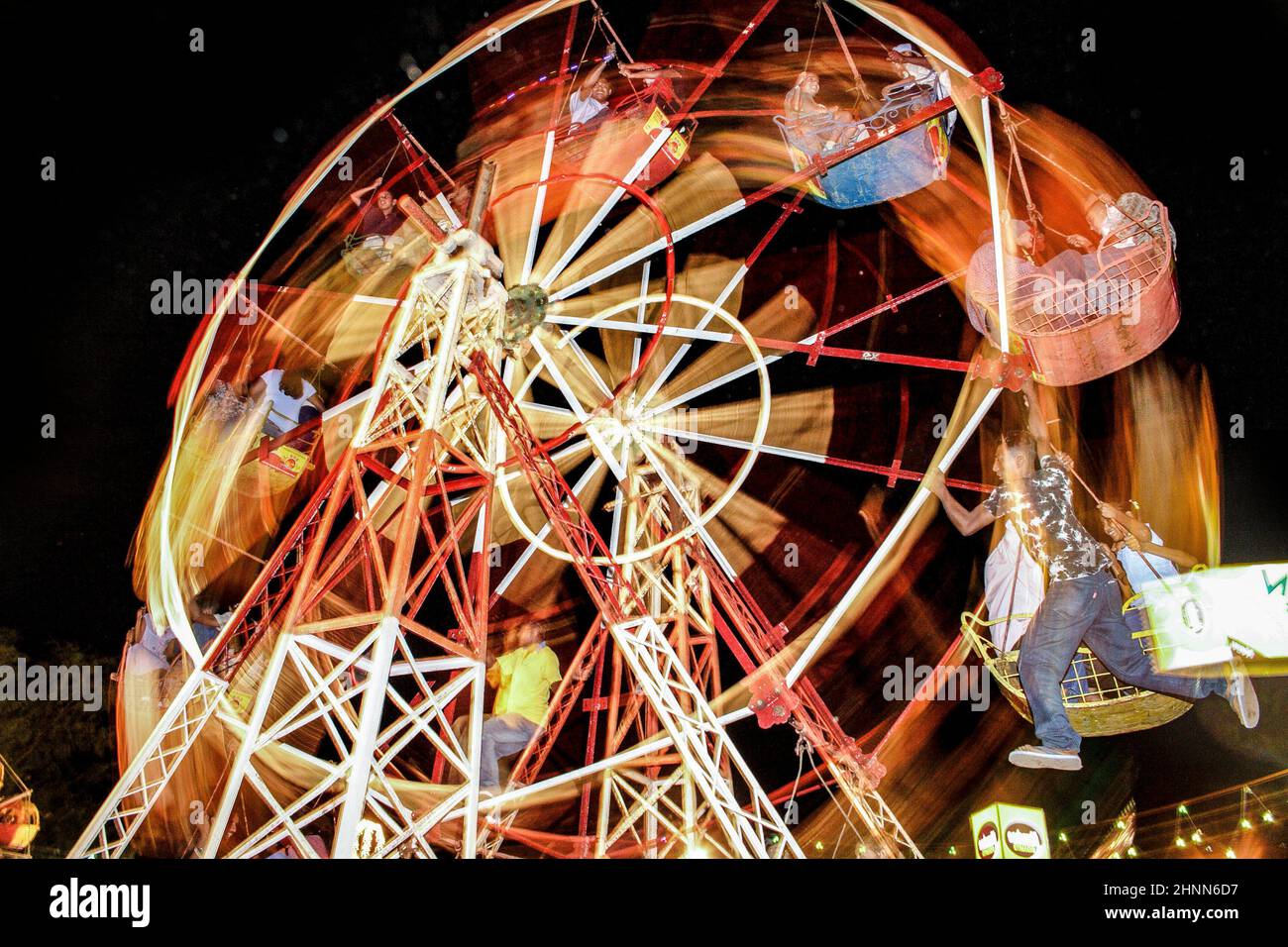 big wheel powered by man Stock Photo - Alamy
