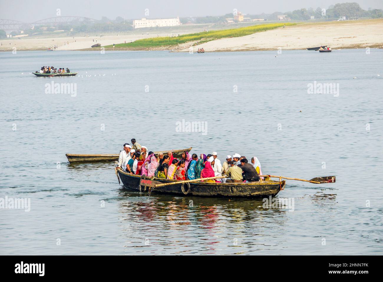 people cross the river Ganges on a ferry Stock Photo - Alamy