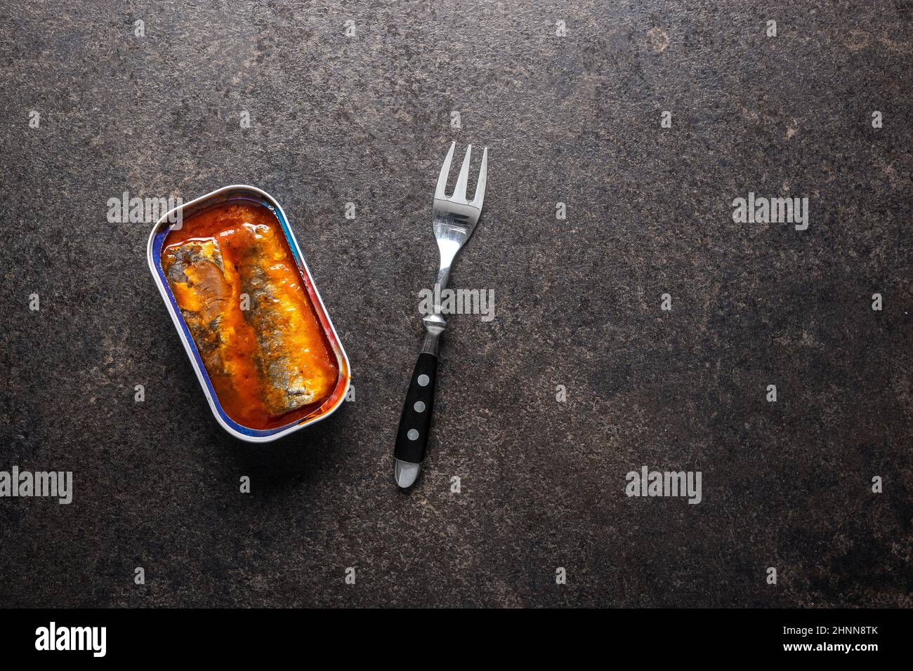 Canned sardines with tomato sauce. Sea fish in tin can. Top view Stock ...