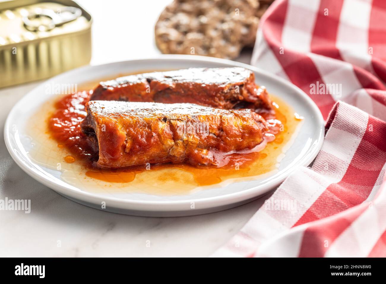 Canned sardines with tomato sauce. Sea fish in tin can Stock Photo - Alamy