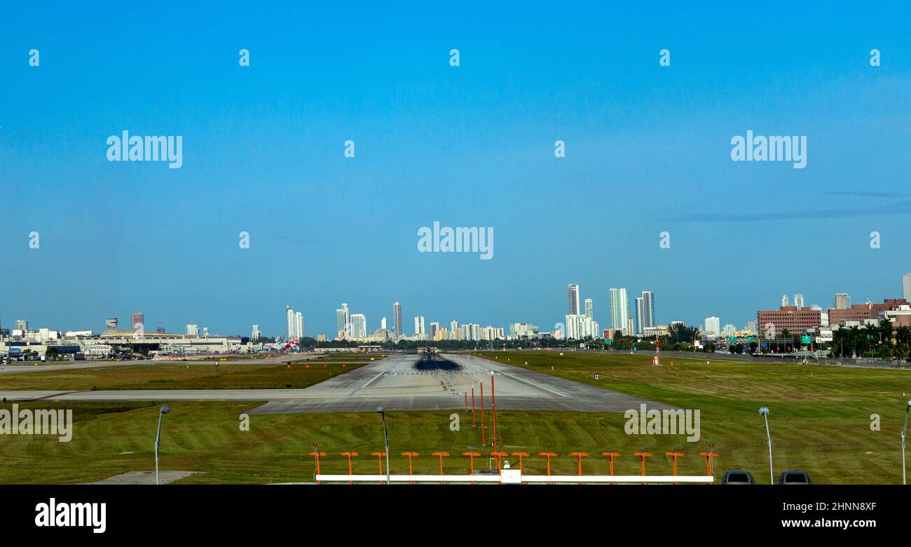 runway with light and radar equipment of Miami international airport ...