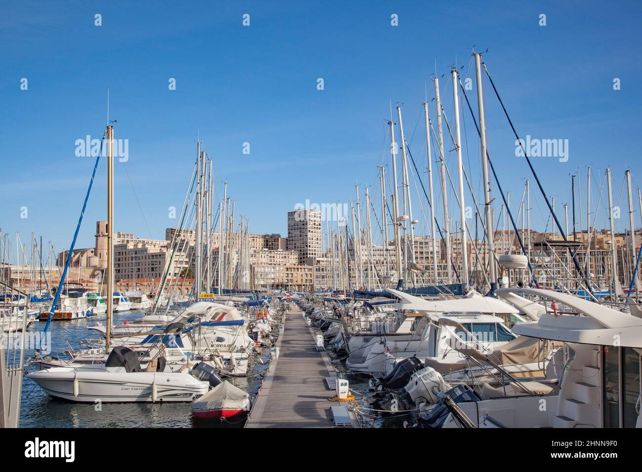 harbor with sailing boats in Marseilles with view to the promenade of ...