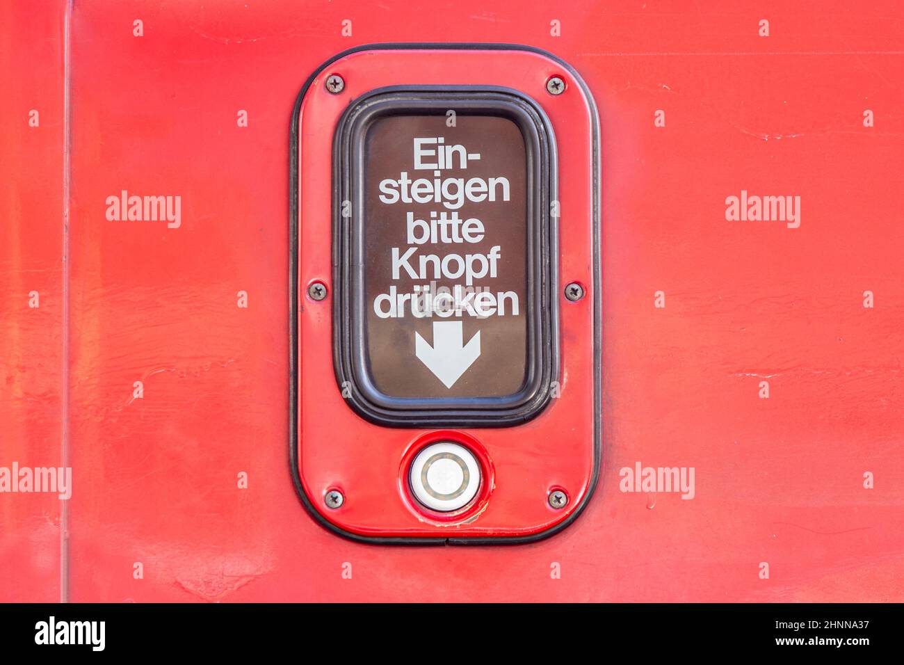 sign for entrance please press button (german: Einsteigen bitte Knopf ...