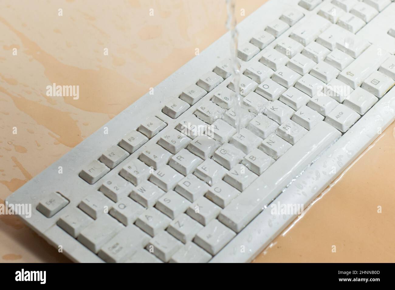 Keyboard in the water, waterproof keyboard, spilled water on the ...