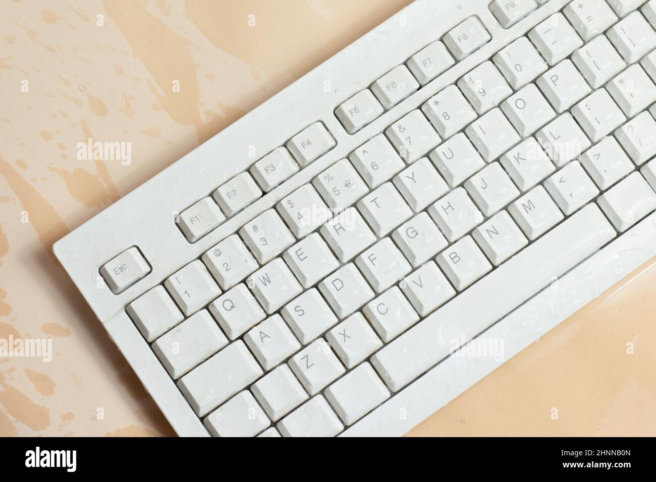 Keyboard in the water, waterproof keyboard, spilled water on the ...