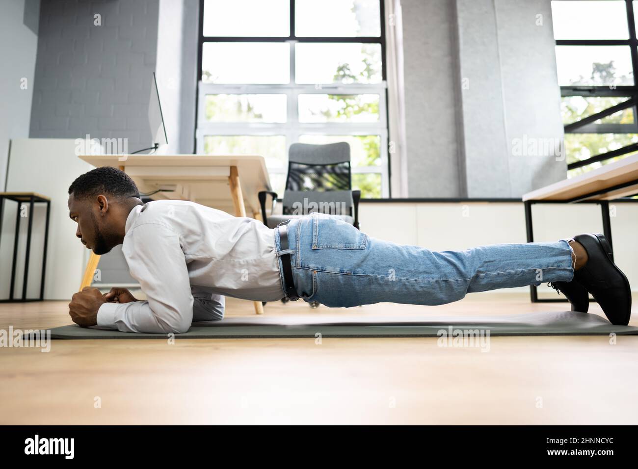 African American Doing Office Exercise Workout Training Stock Photo - Alamy