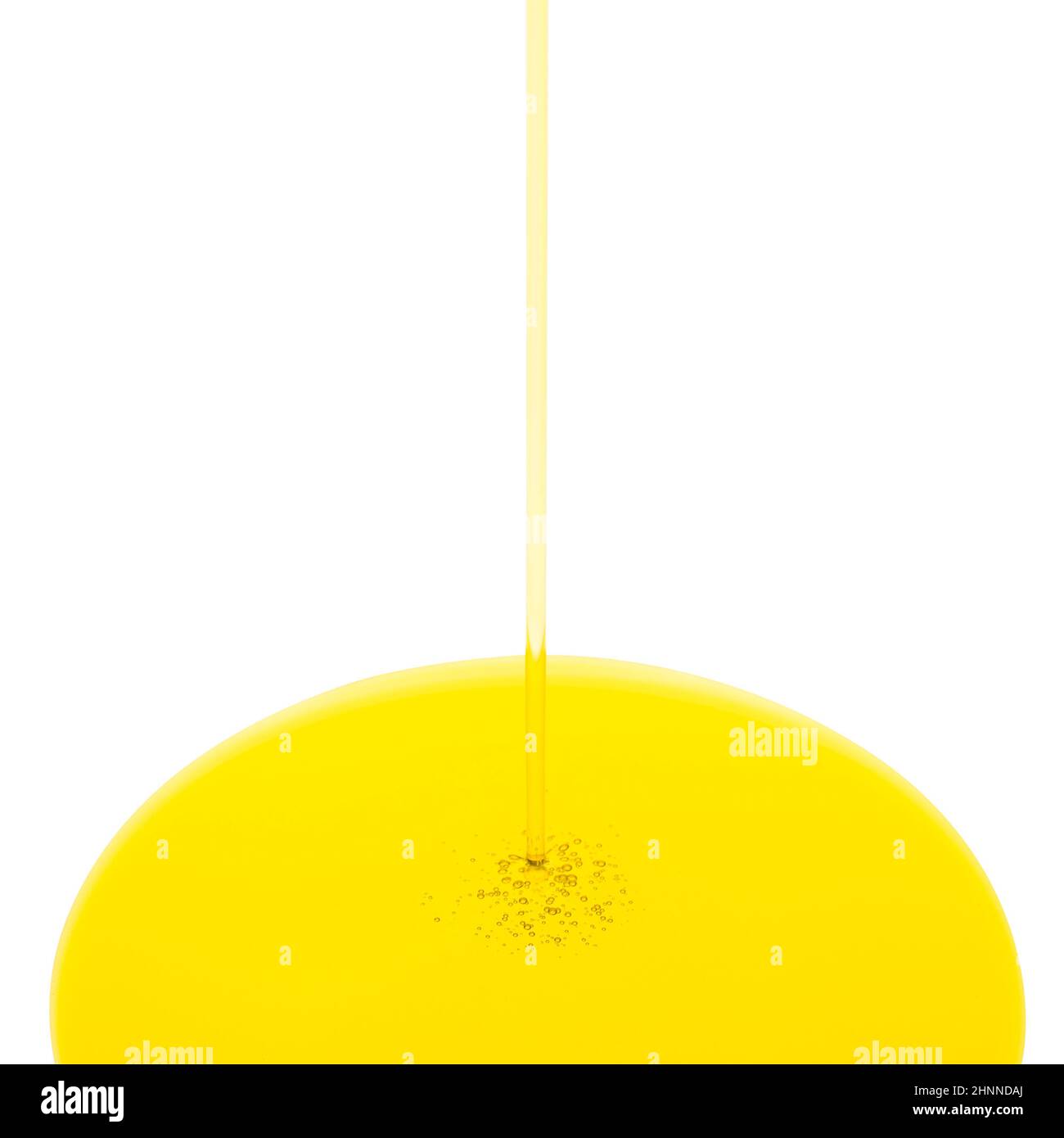 Pouring oil flow isolated on white. Circle poodle. Square format Stock ...