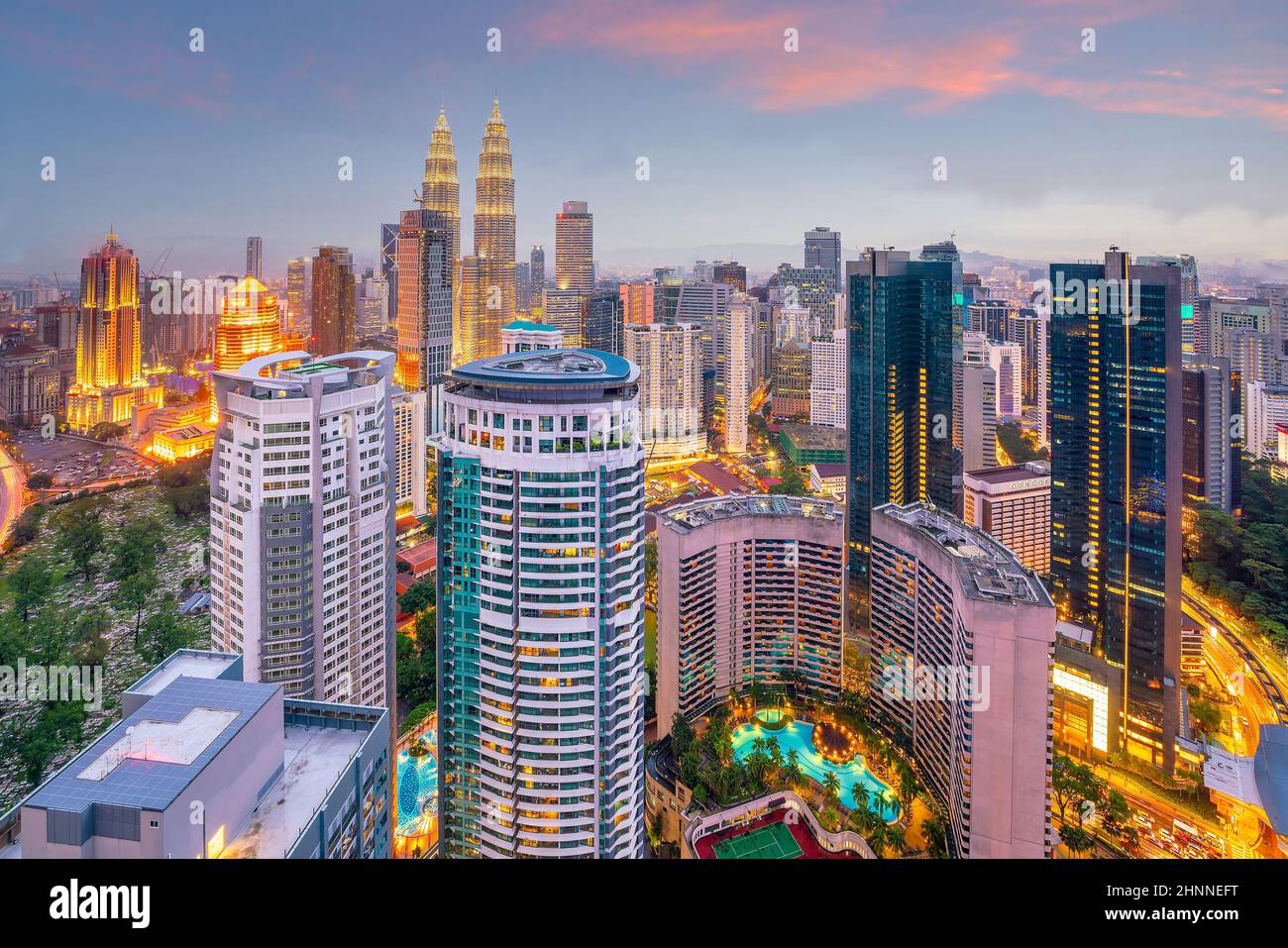 Downtown Kuala Lumpur city skyline cityscape of Malaysia at sunset ...