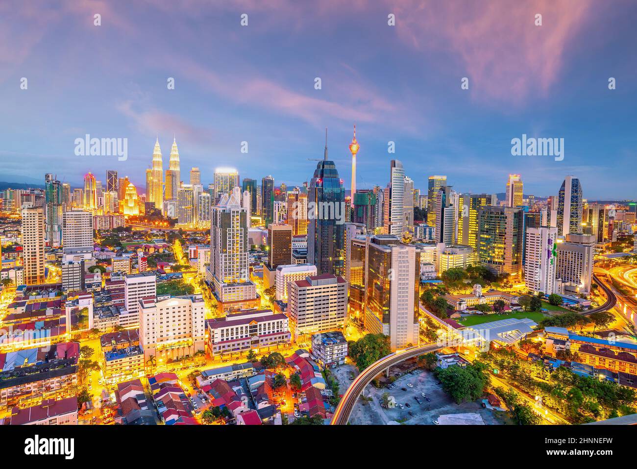 Downtown Kuala Lumpur city skyline cityscape of Malaysia at sunset ...