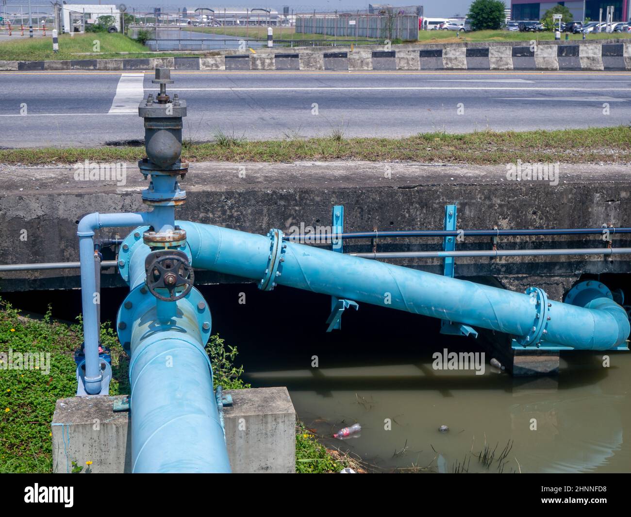 Control knobs for big water blue pipes Stock Photo - Alamy