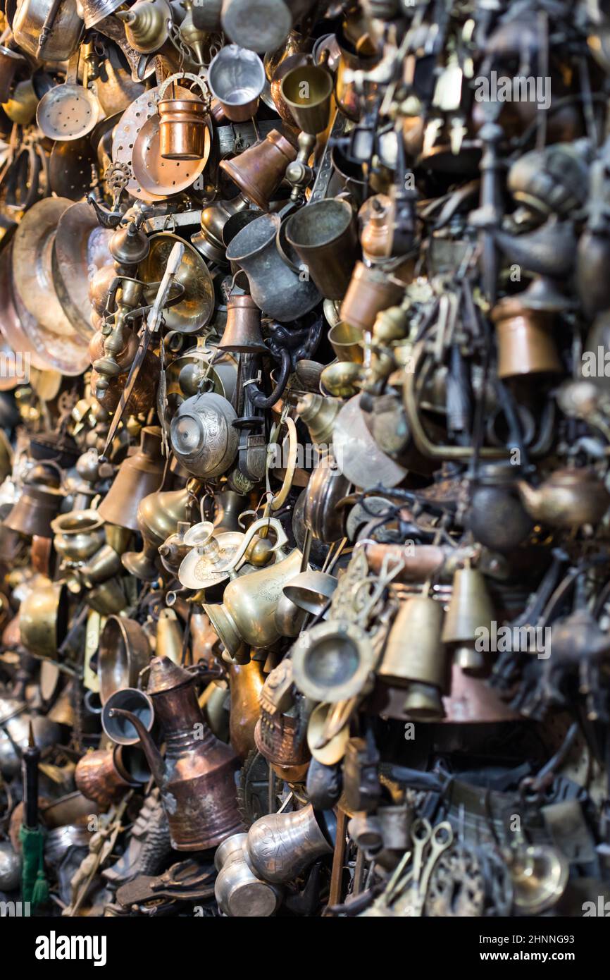 Various old objects for sale in an antique shop Stock Photo - Alamy