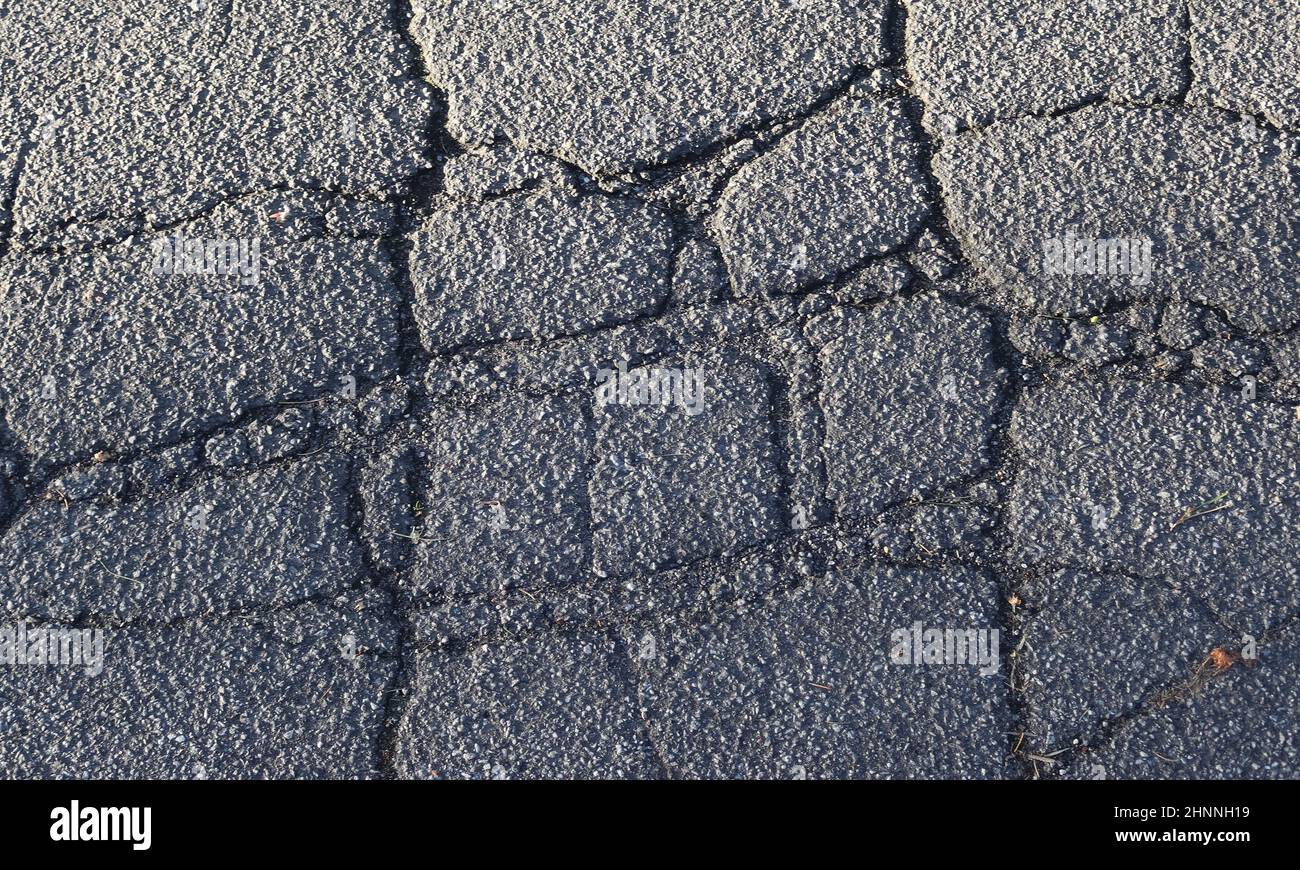 Detailed view on asphalt surfaces of different streets and roads with ...