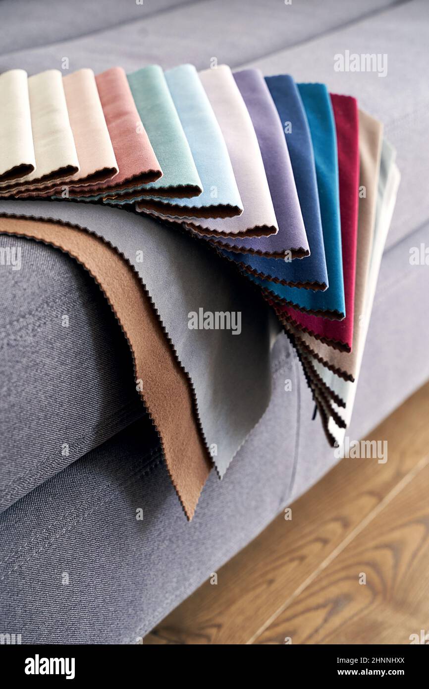 Colorful upholstery fabric samples on the home sofa Stock Photo - Alamy