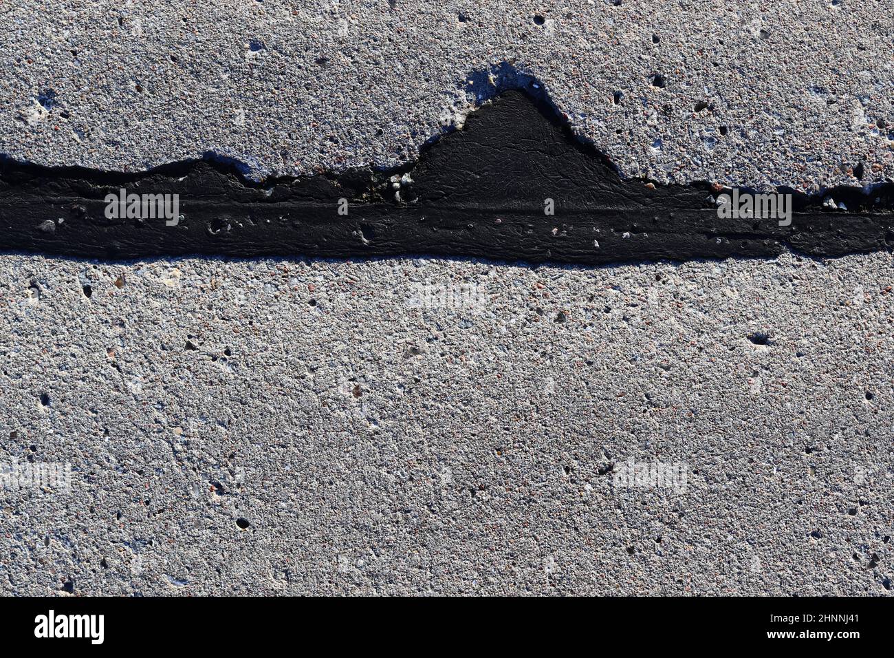 Detailed view on asphalt surfaces of different streets and roads with ...