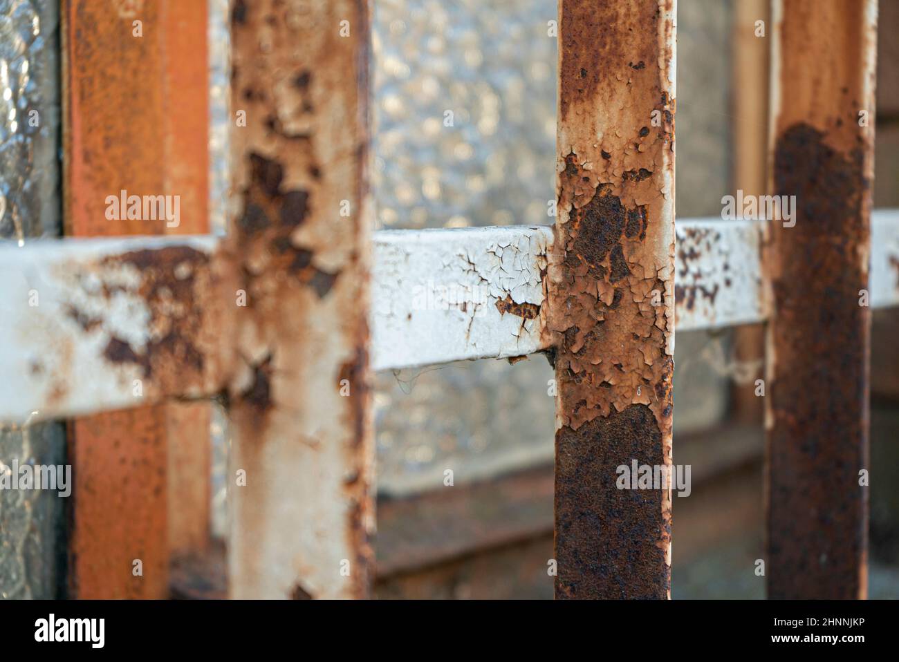 Old rusty grate detail in a house window Stock Photo - Alamy